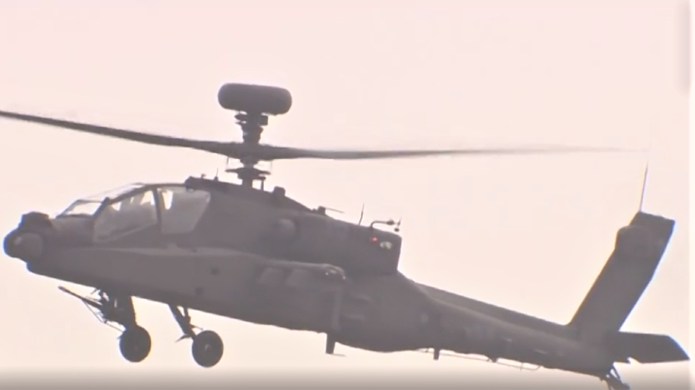 國軍阿帕契直升機飛彈發射架掉落 駕駛疑似演訓誤觸開關 — TITV News 原視新聞網